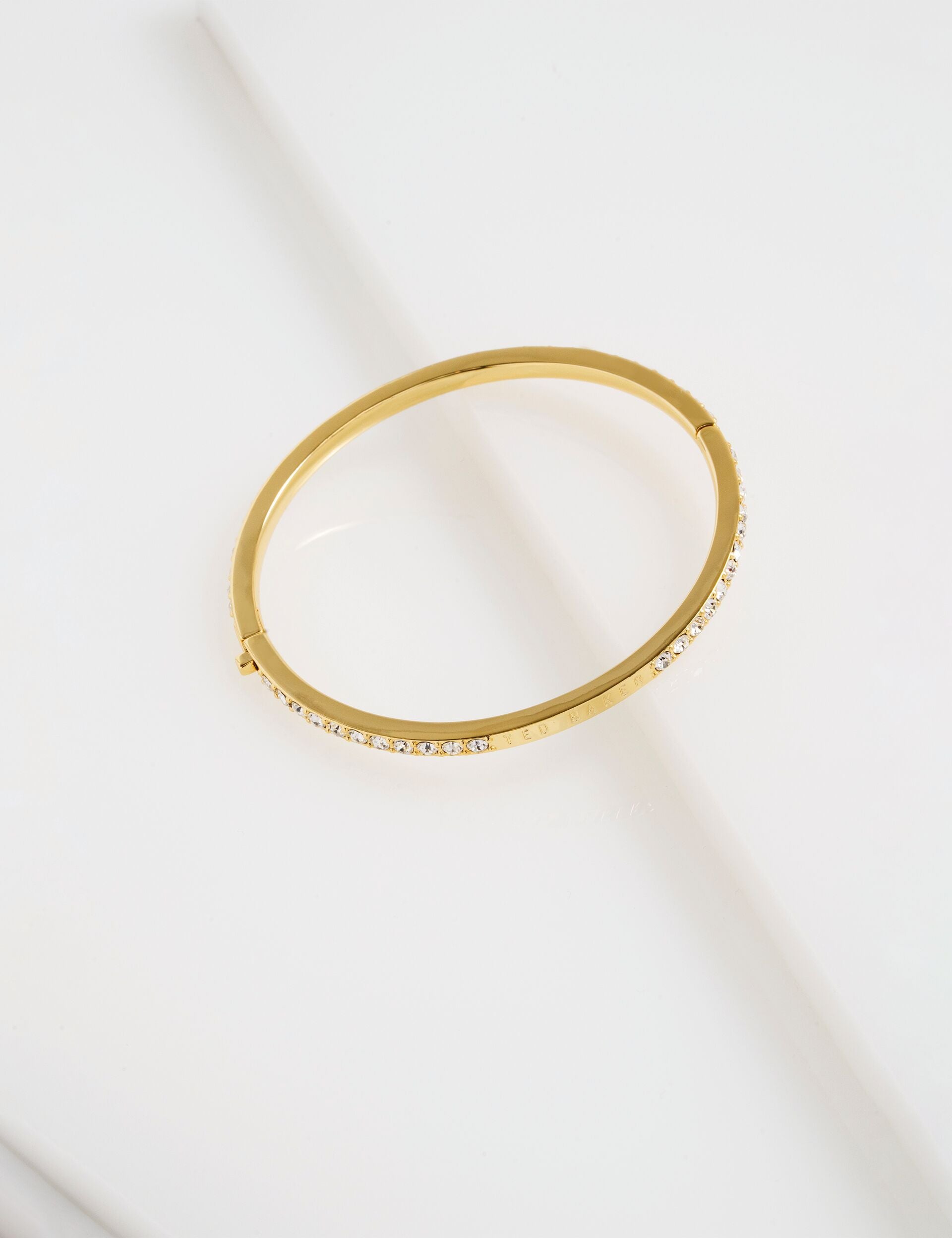 Gold Slim Crystal Shimmer Bangle Bracelet | CLAUDIA | Ted Baker
